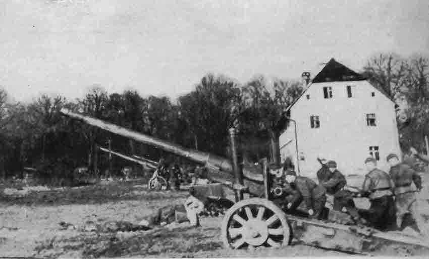 122mm Gun M1931 bombarding a German town, 1945