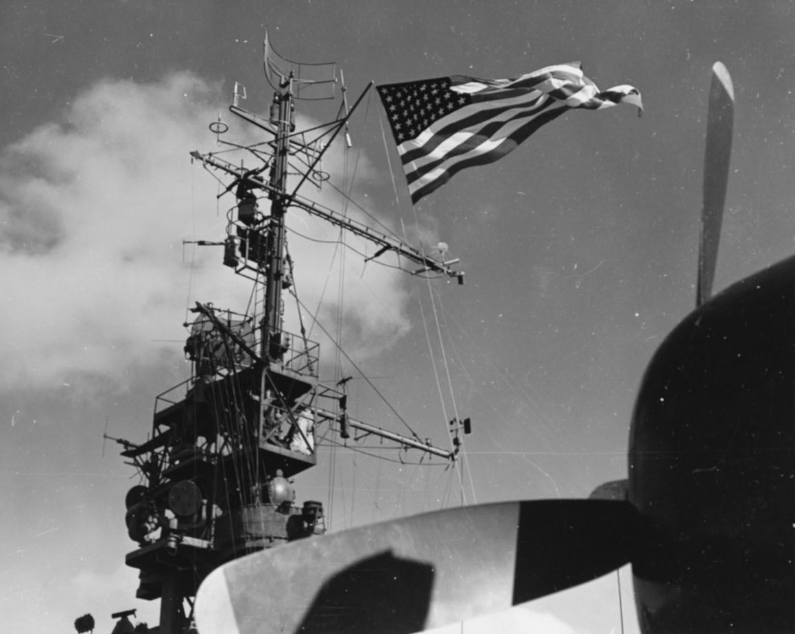 USS Monterey (CVL-26) flying victory flag, 1945