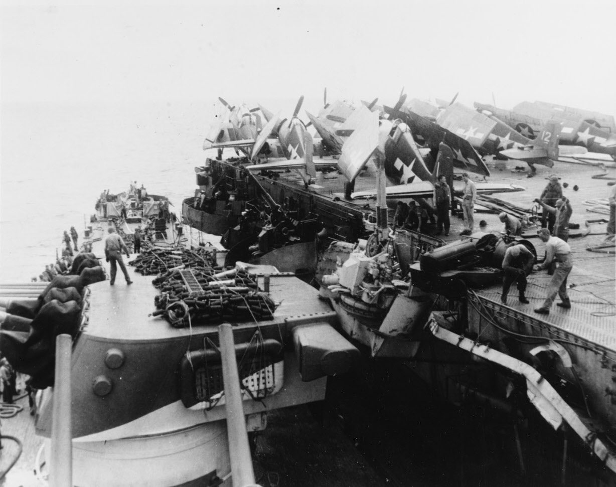 USS Birmingham (CL-62) alongside USS Princeton (CVL-23), 24 October 1944.