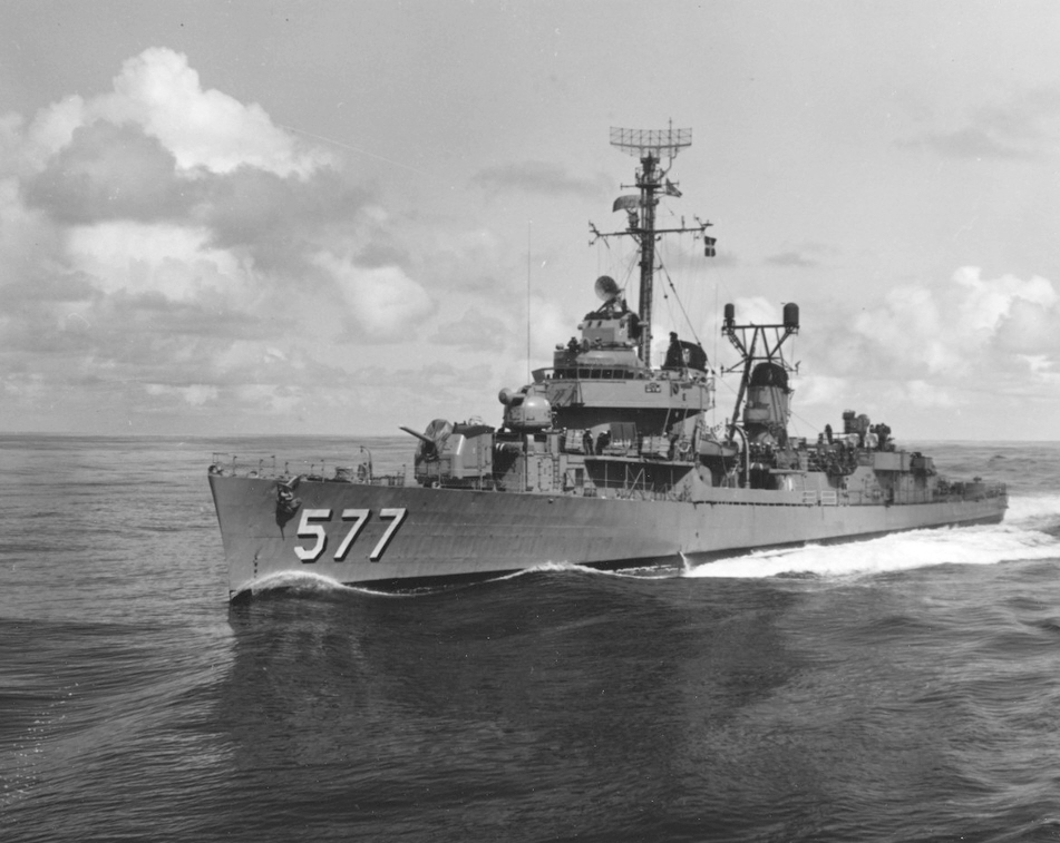 USS Sproston (DD-577) coming alongside Coral Sea (CVA-43), 1965