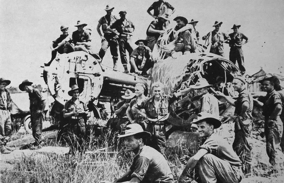 Australian Troops on wrecked Japanese bomber, Borneo