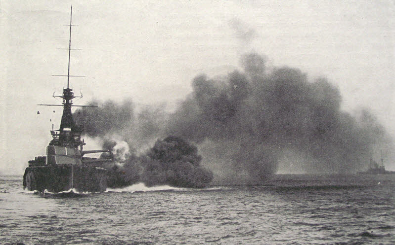 HMS Monarch firing broadside