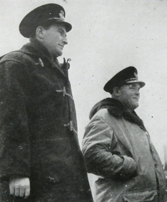 Commander D.G.F.W MacIntyre on bridge of HMS Bickerton